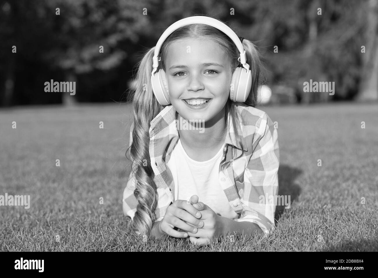 Happy girl enjoying listening Black and White Stock Photos & Images - Alamy