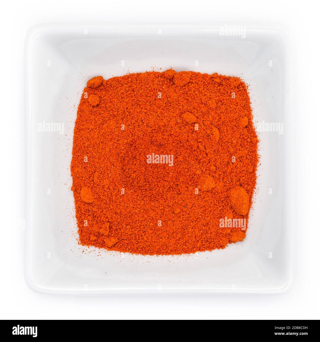 Hungarian red paprika powder in a bowl in top view Stock Photo - Alamy