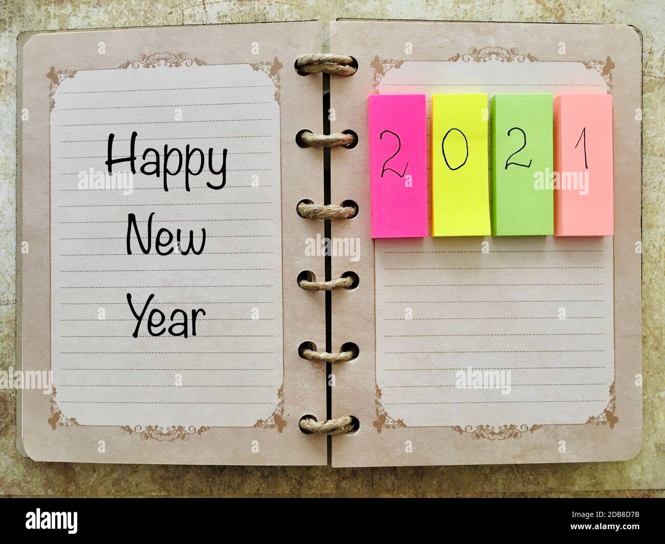 Open diary with a 2021 new years concept Stock Photo - Alamy