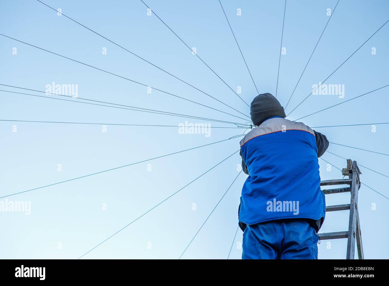 Man working on electrical wire hi-res stock photography and images - Alamy