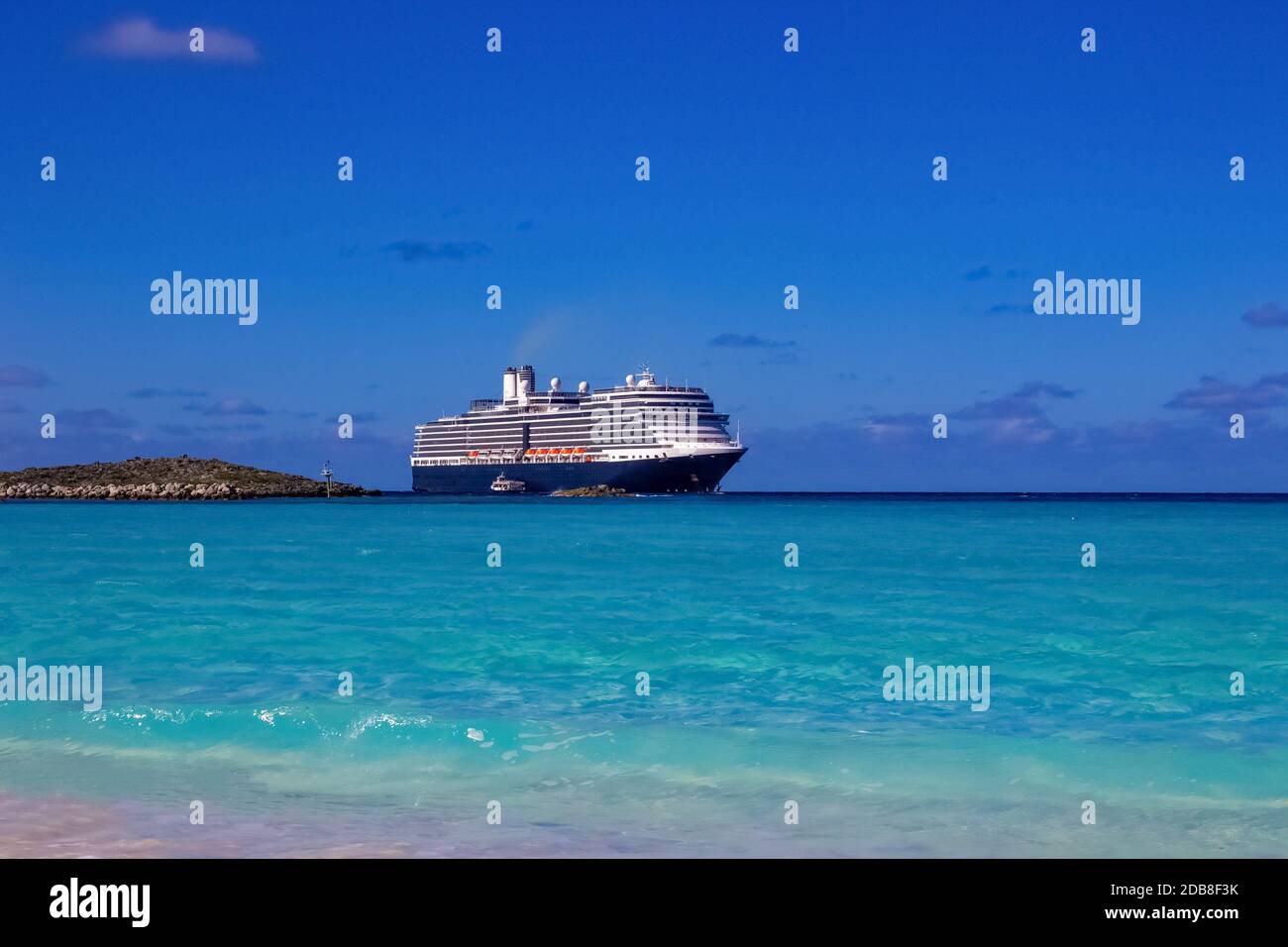 The view of empty beach on Half Moon Cay island at Bahamas. Blue water ...