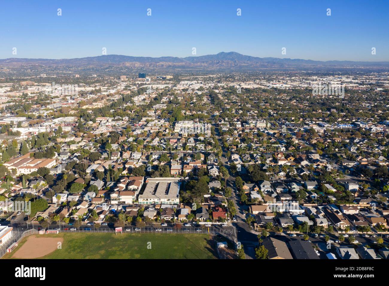 Aerial view over the vast coastal plain of Orange County, California ...