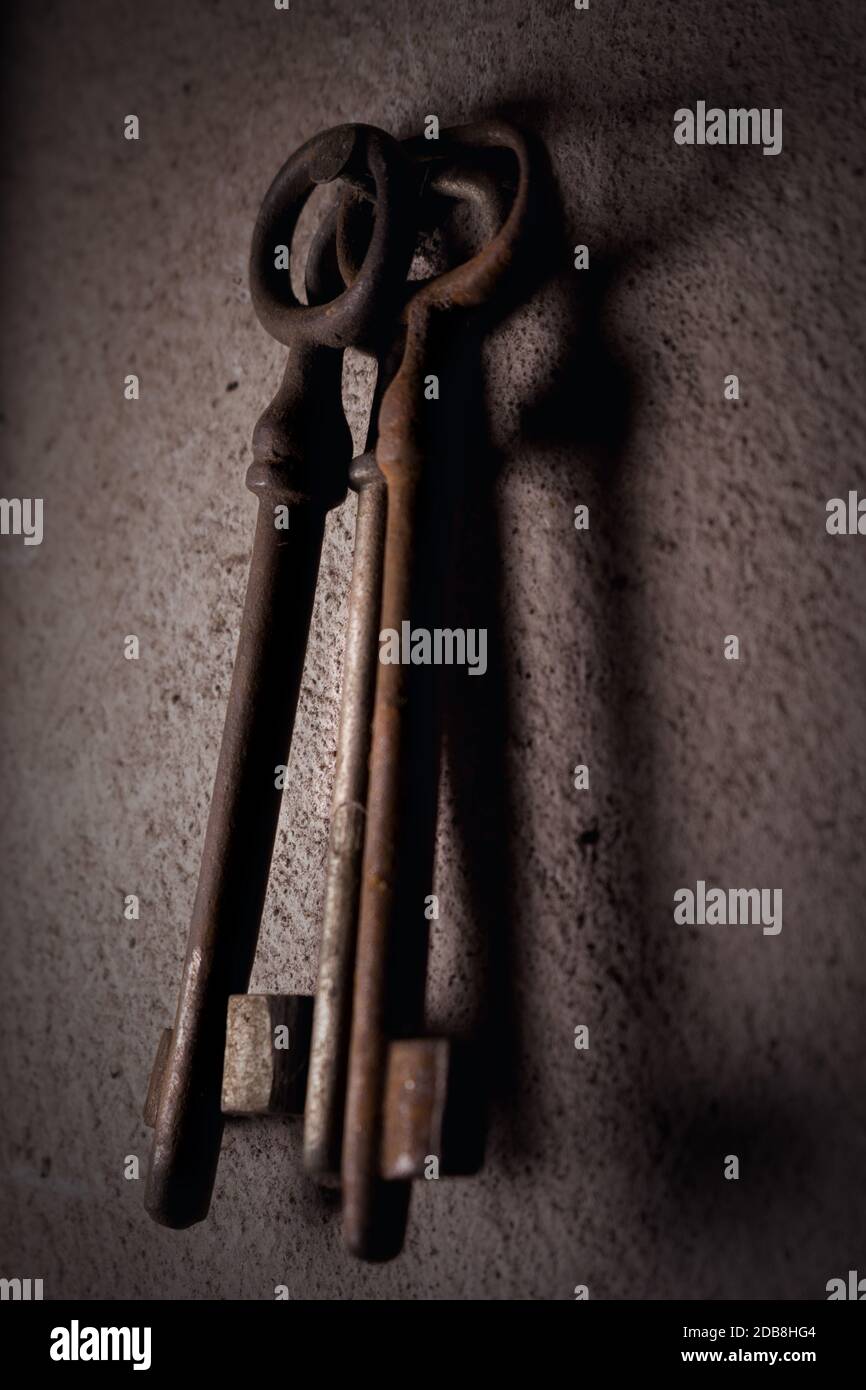 Old Rusted Keys Hanging On The Wall Stock Photo - Alamy