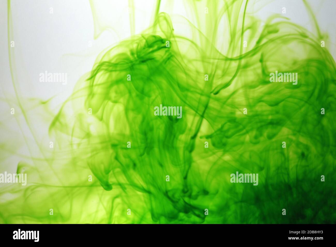 Green Color drops in water background Stock Photo - Alamy