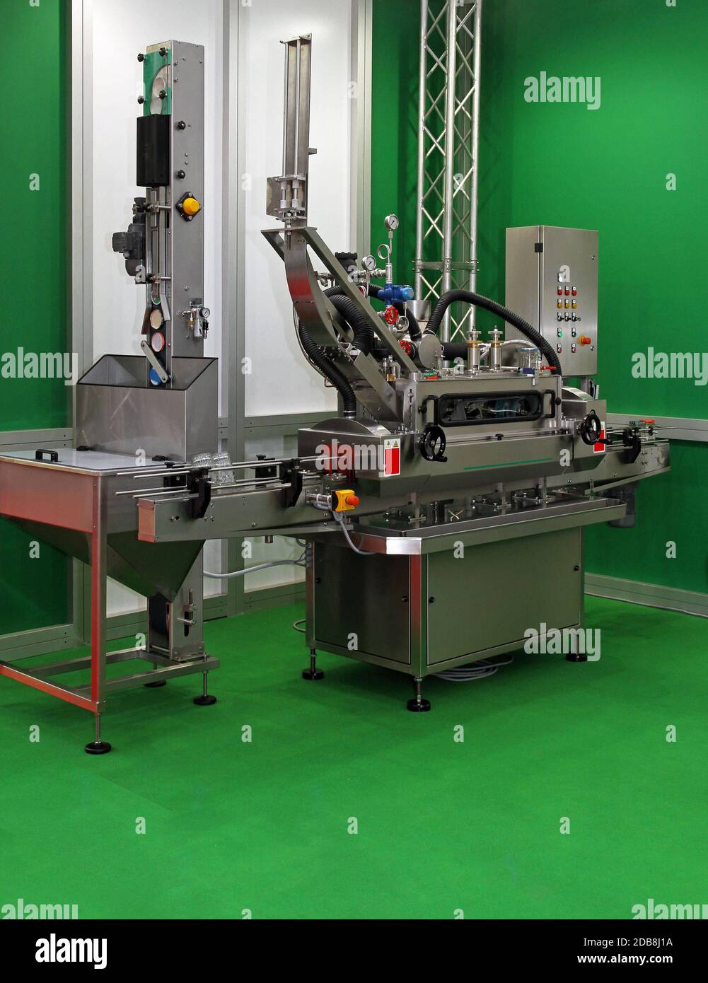 Packaging machine for glass jars with lids Stock Photo - Alamy