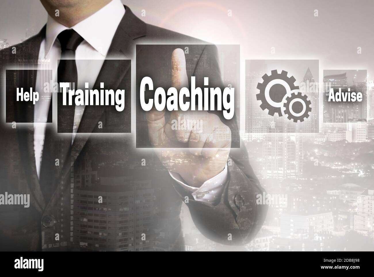 Coaching businessman with city background concept Stock Photo - Alamy