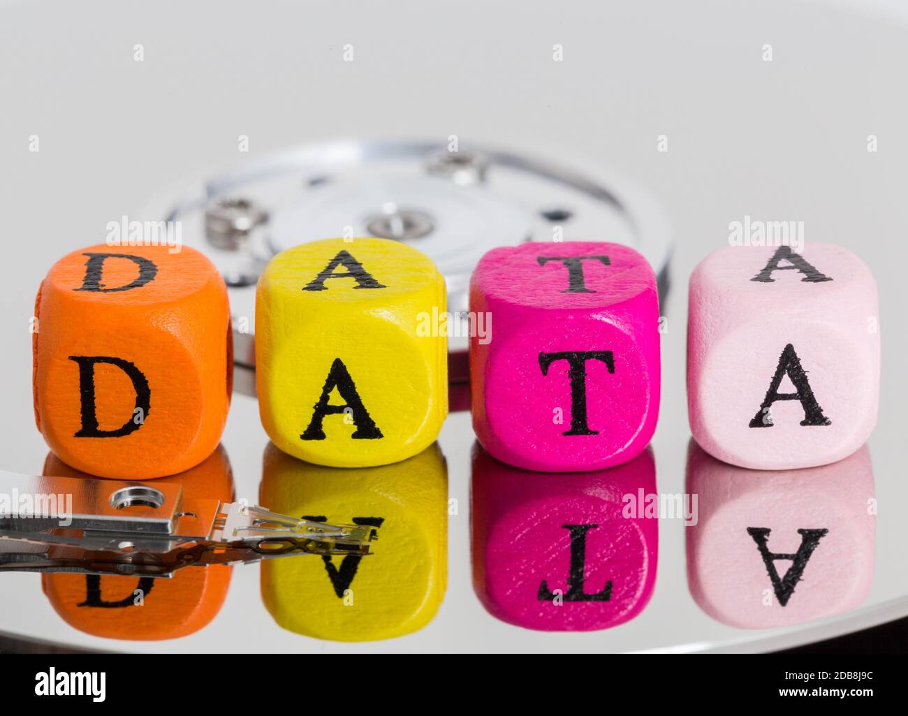 Data letter cube on hard disk concept Stock Photo - Alamy