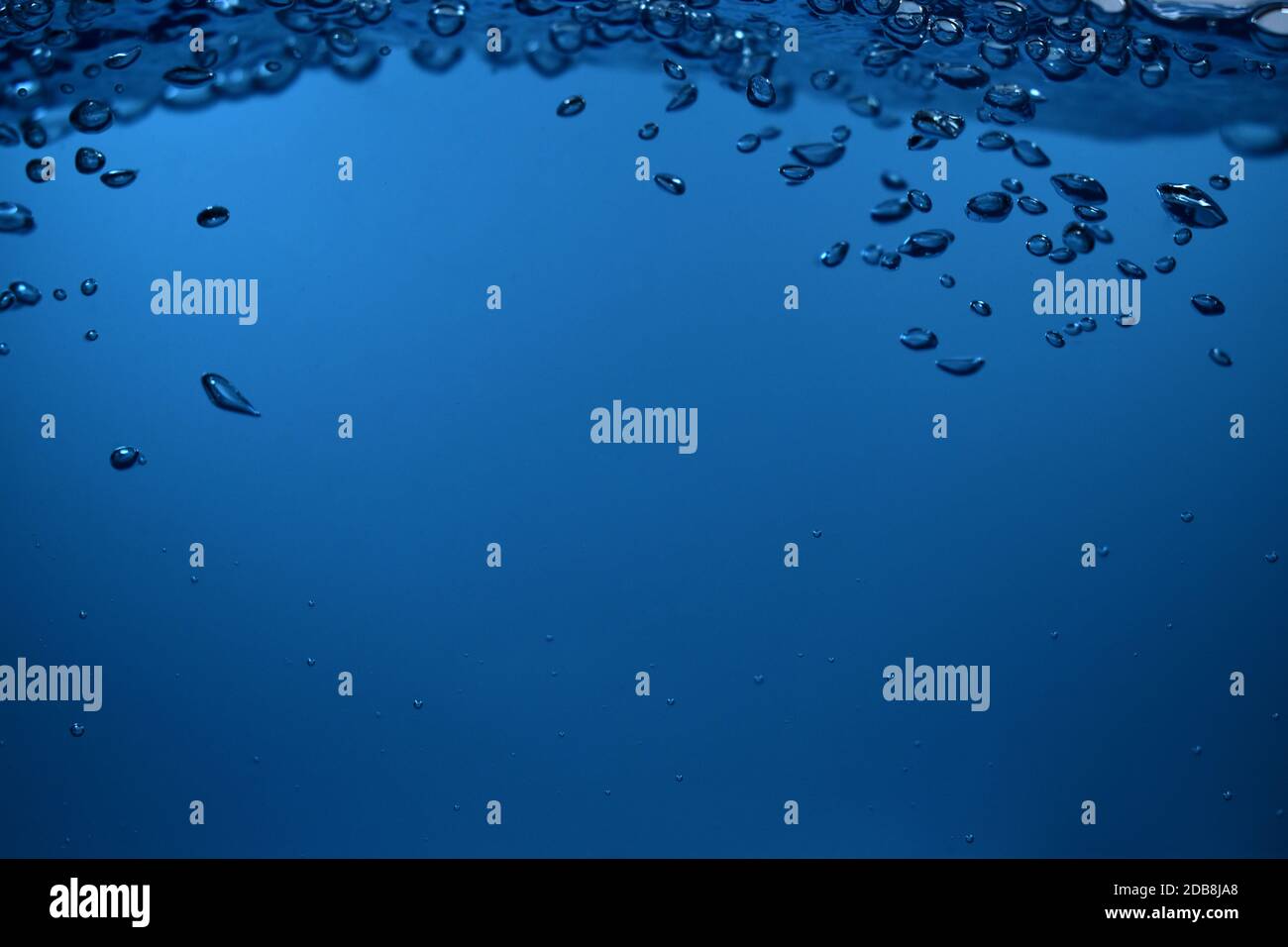 surface Bubbles under Blue water back ground Copy space Stock Photo - Alamy