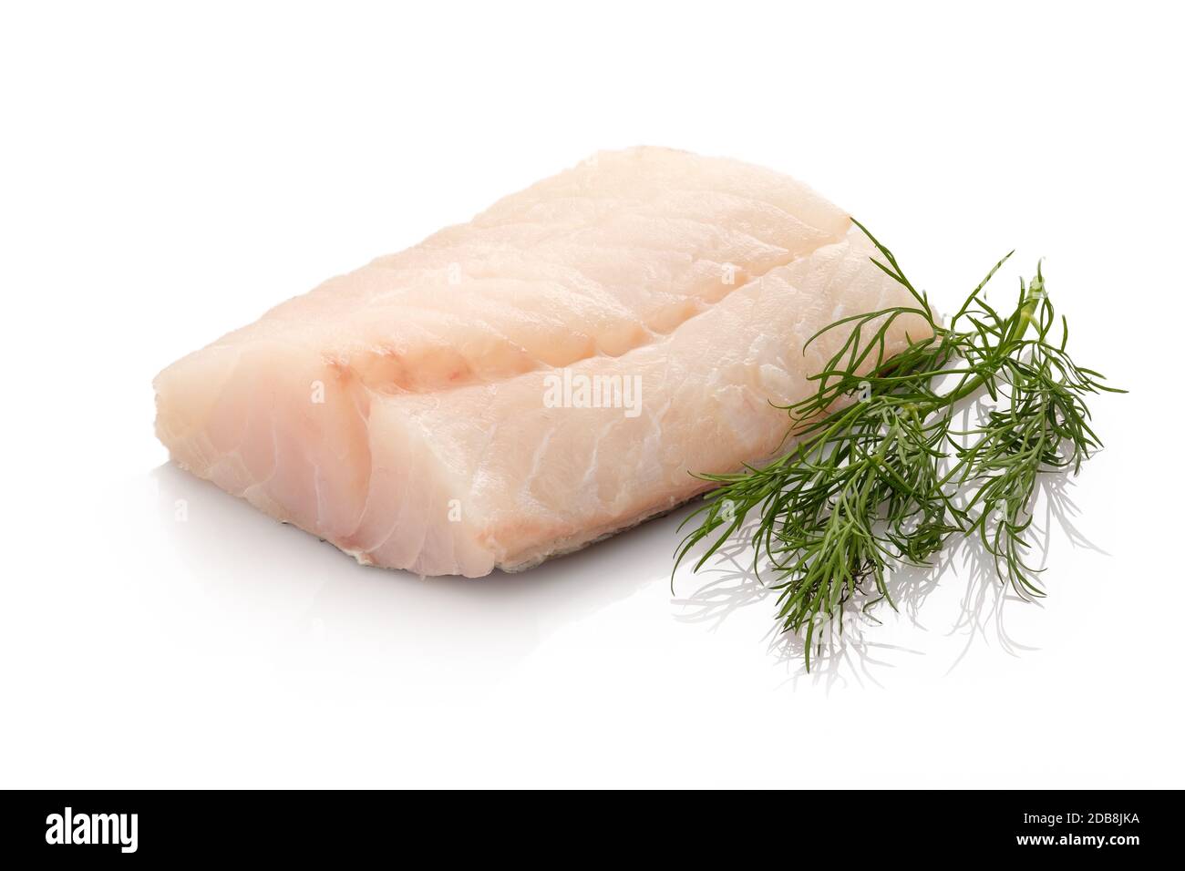 Raw cod fish filet with green dill white isolated Stock Photo - Alamy