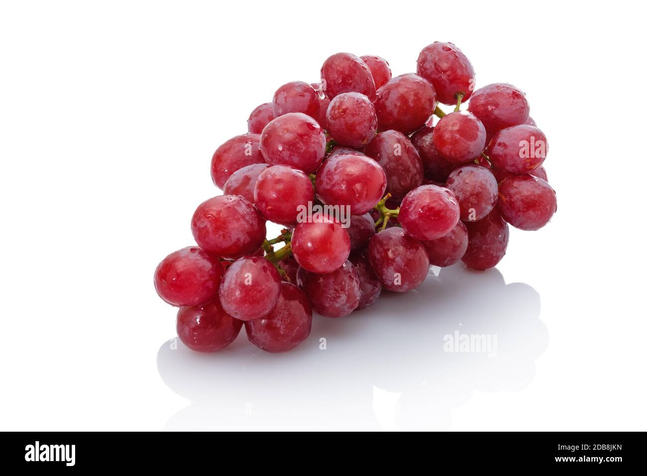 Red fresh table grapes white isolated Stock Photo - Alamy