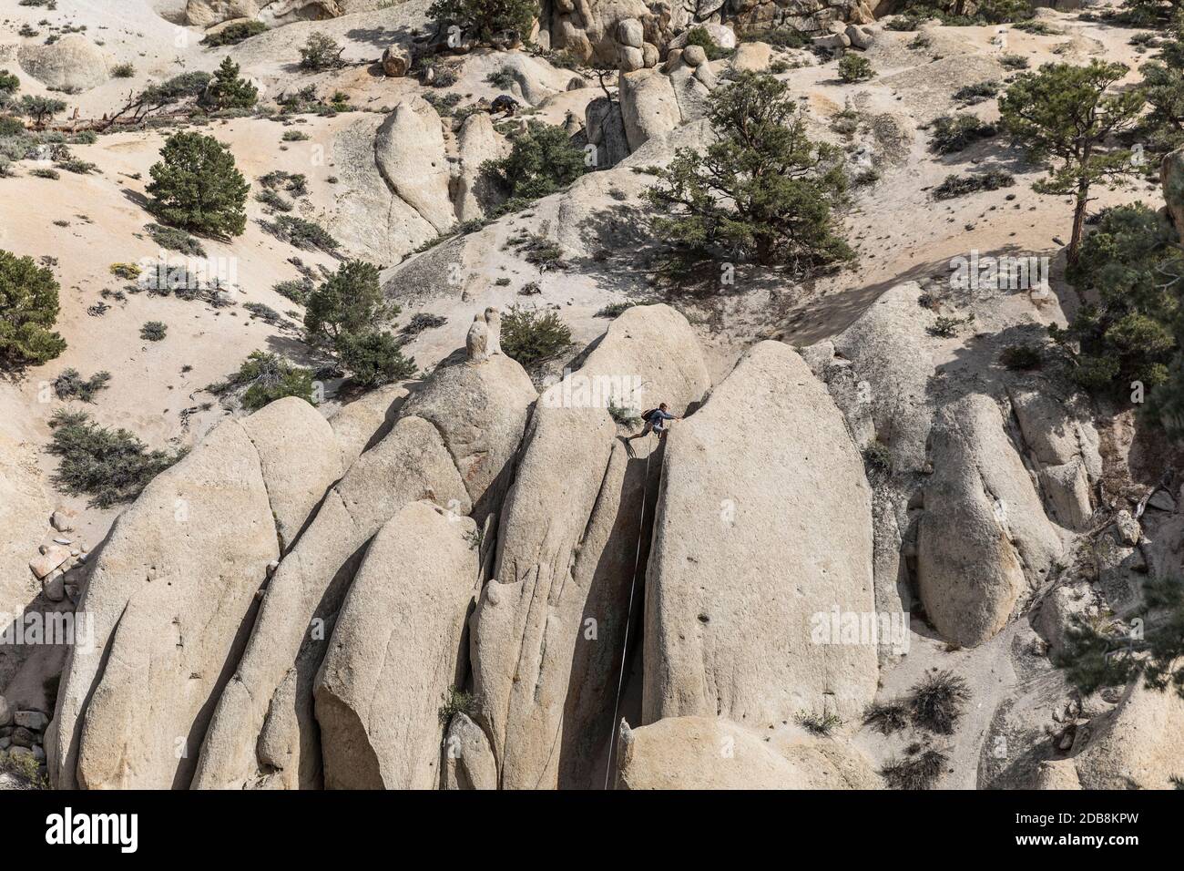 Climber on top of the boulder in Bishop, California Stock Photo - Alamy