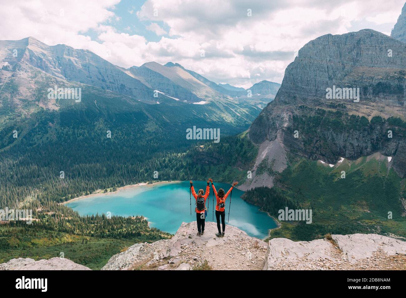 Girls hiking incredible Glacier National Park Stock Photo - Alamy