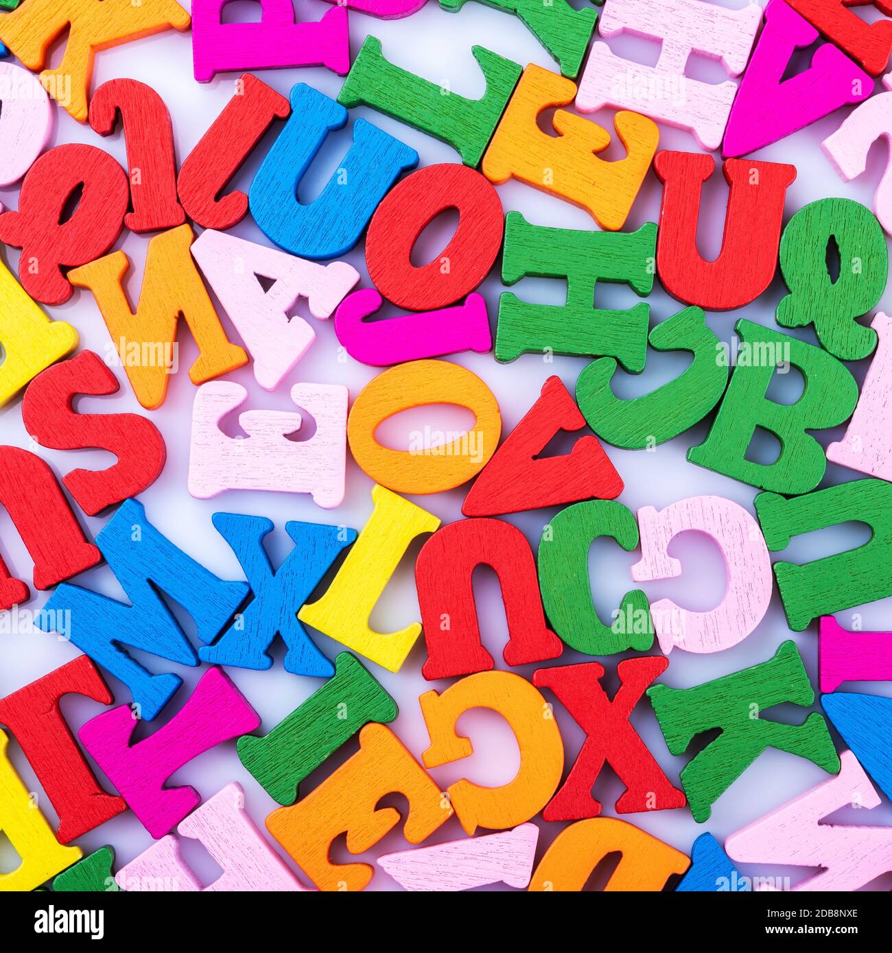 Letters of the alphabet are wooden scattered randomly macro photography ...