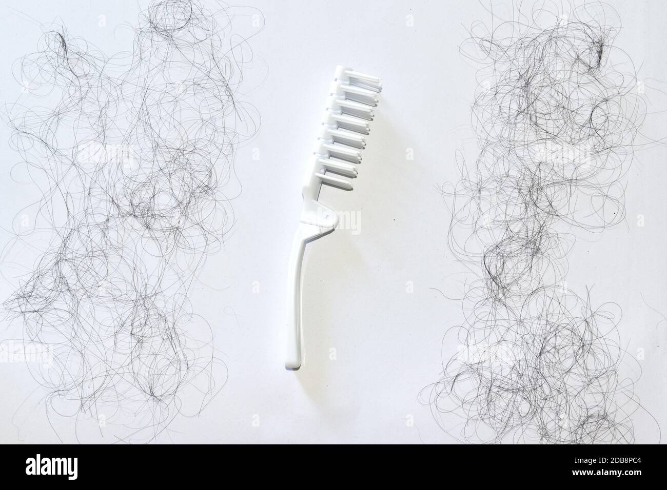 Bad combing causes hair damage Stock Photo - Alamy