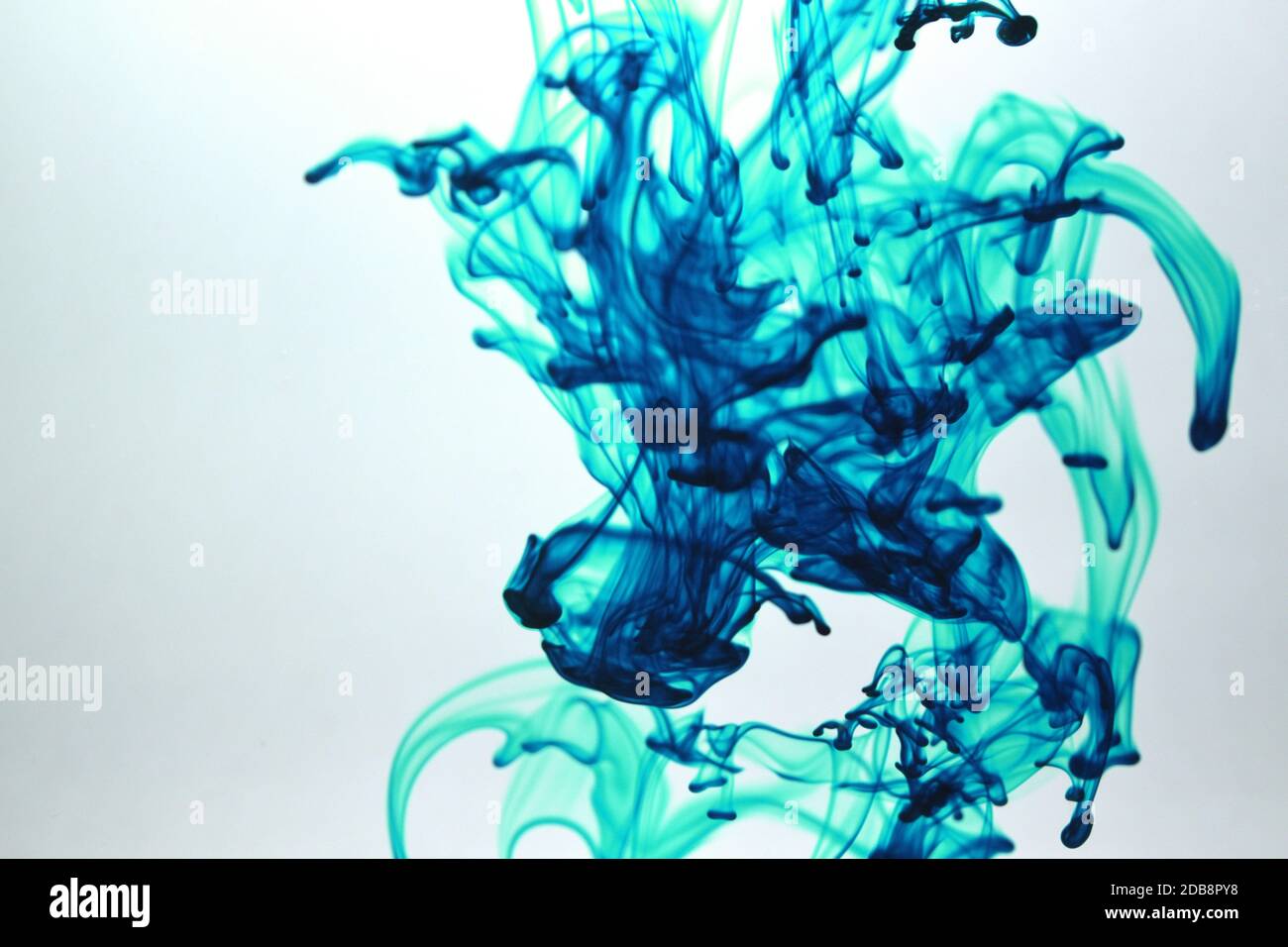 Blue Color drops in water background Stock Photo - Alamy