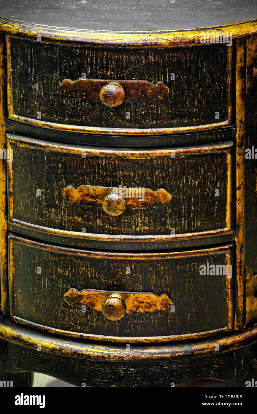 Front side of wooden cabinet with drawers Stock Photo - Alamy