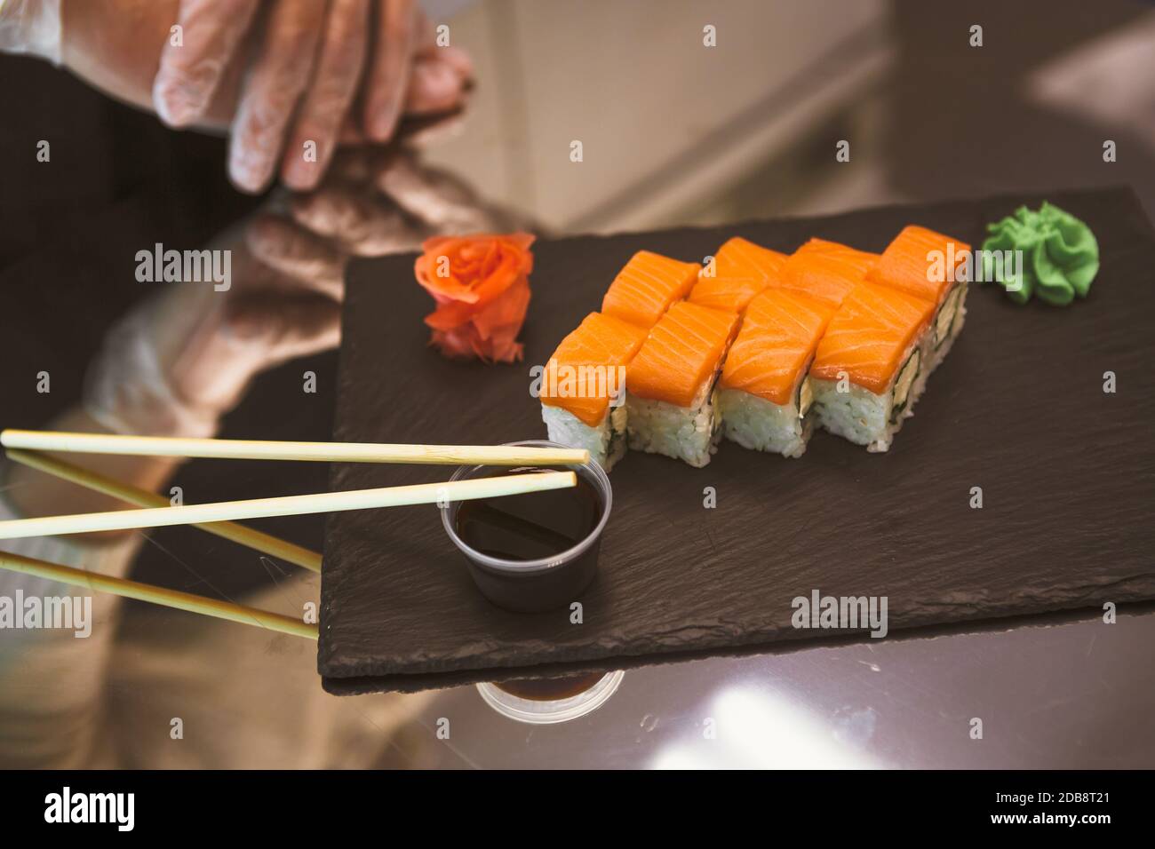 Classic roll philadelphia on black slate plate Stock Photo - Alamy