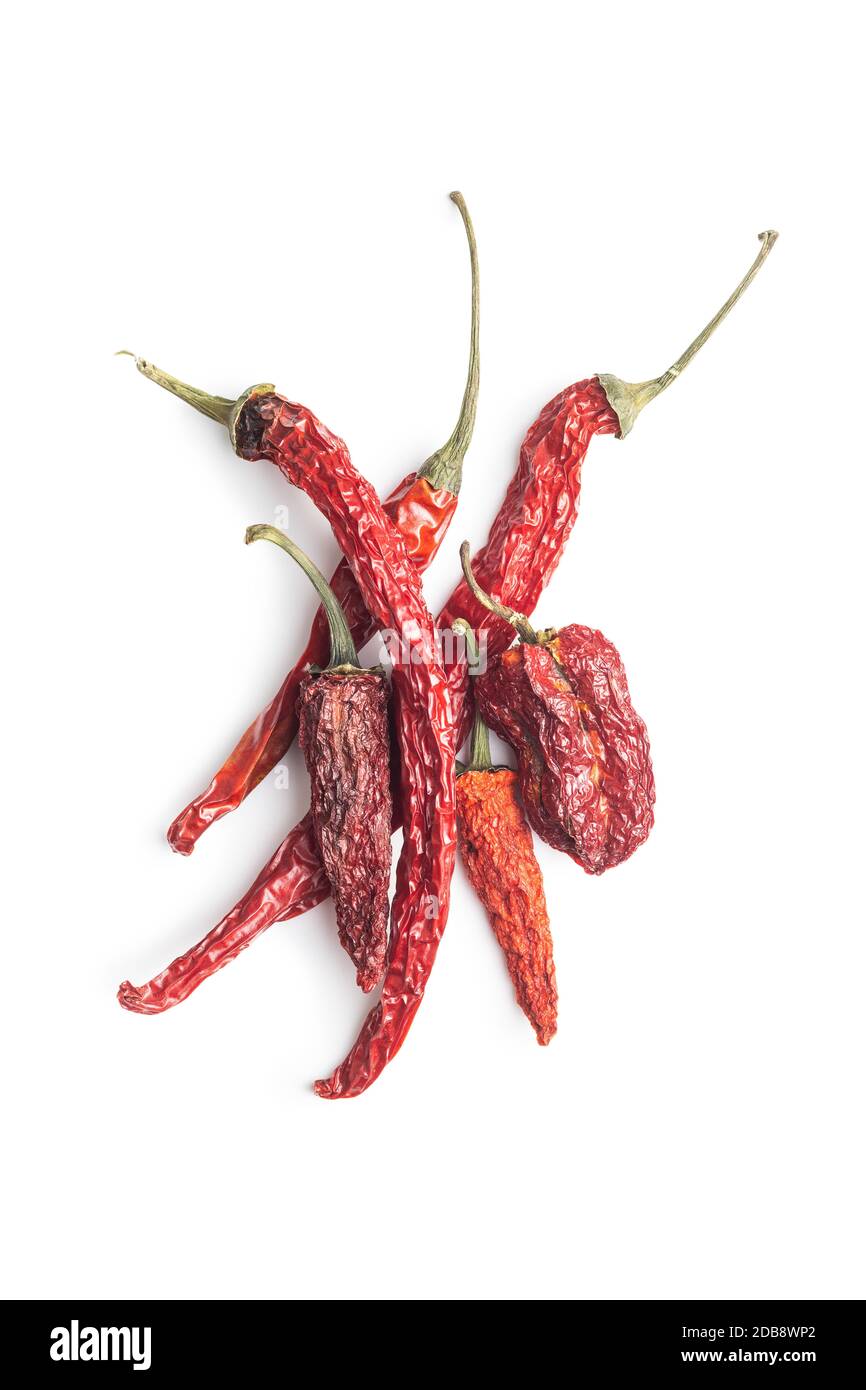 Dried red chili peppers isolated on white background Stock Photo - Alamy