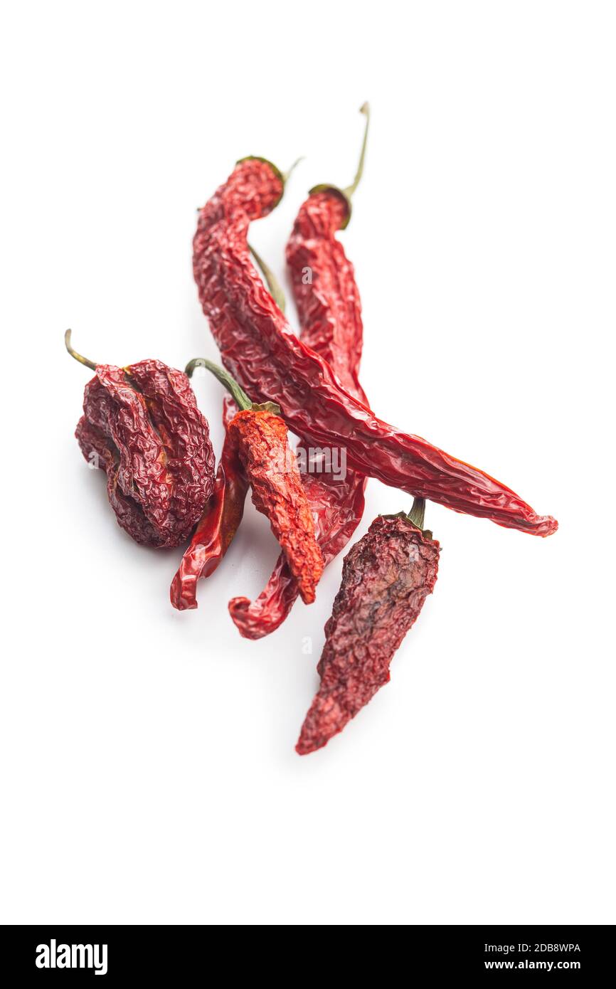 Dried red chili peppers isolated on white background Stock Photo - Alamy