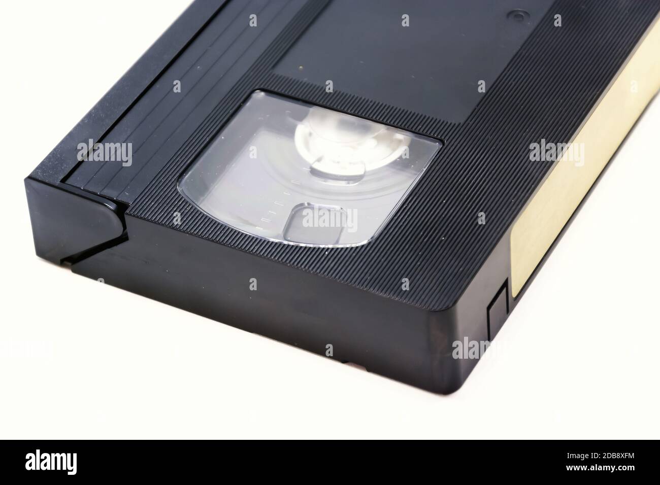 Detail of a VHS format videotape isolated on a white background. Home ...