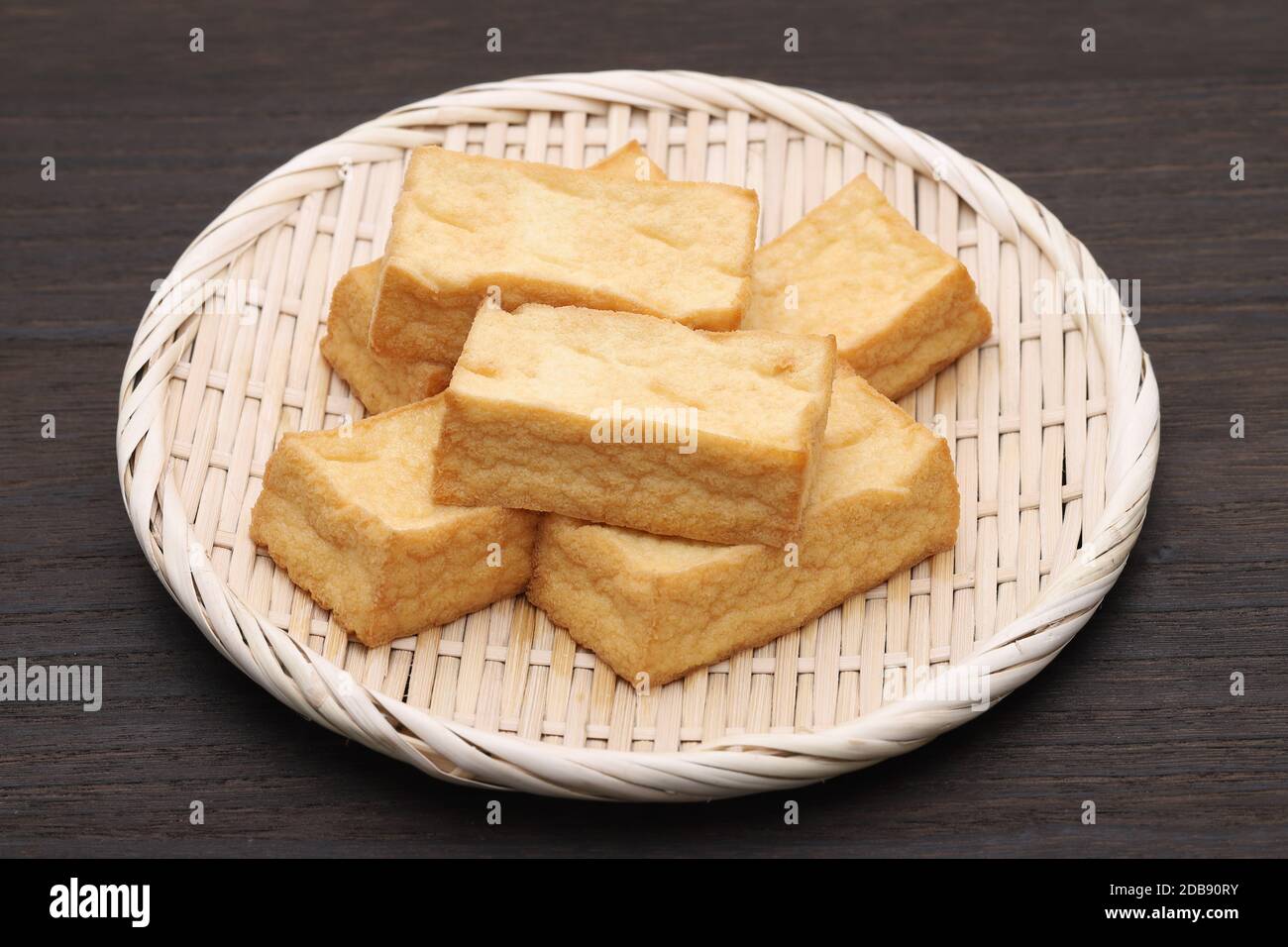 Japanese food, Age tofu cuisine in bamboo basket Stock Photo - Alamy