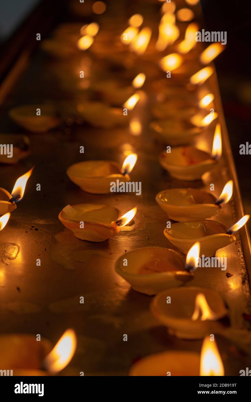 Diwali oil lamp in indian temple Stock Photo - Alamy