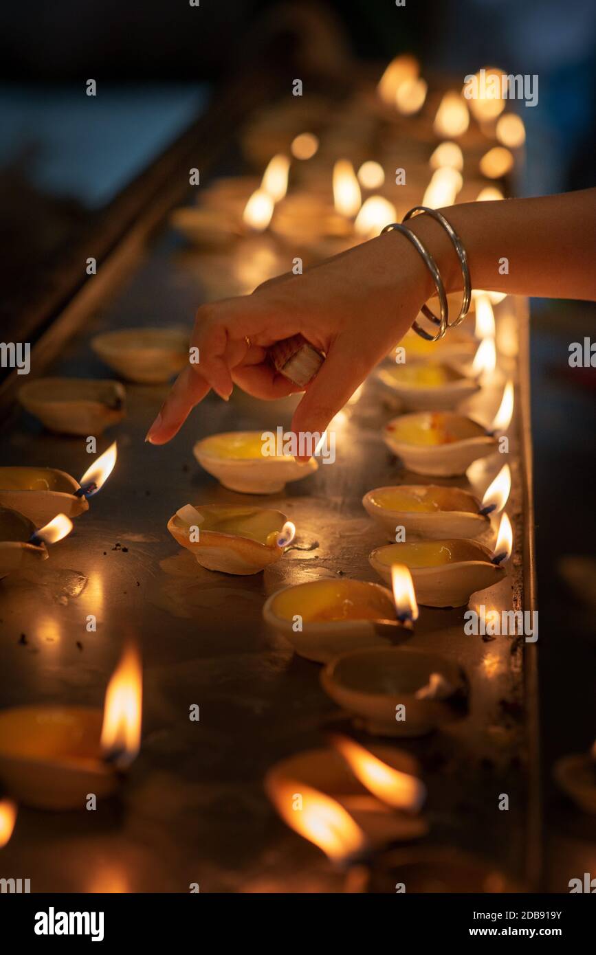 Diwali oil lamp in indian temple Stock Photo - Alamy