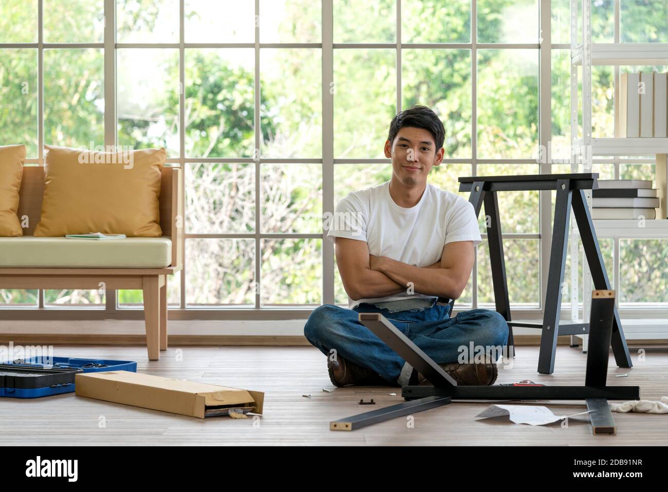 Handyman installing wooden bench in new house. House renovation service ...