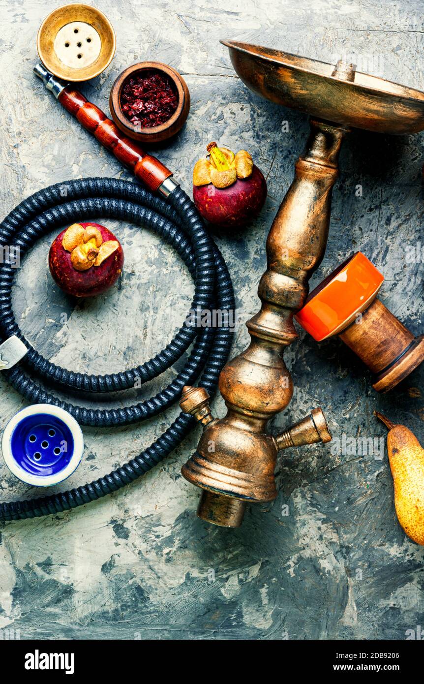Shisha with fruit tobacco.Hookah with the aroma of tropical mangosteen ...