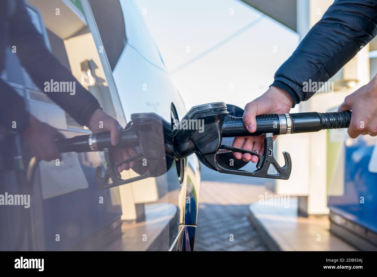 refueling a passenger car tank at a gas station Stock Photo - Alamy