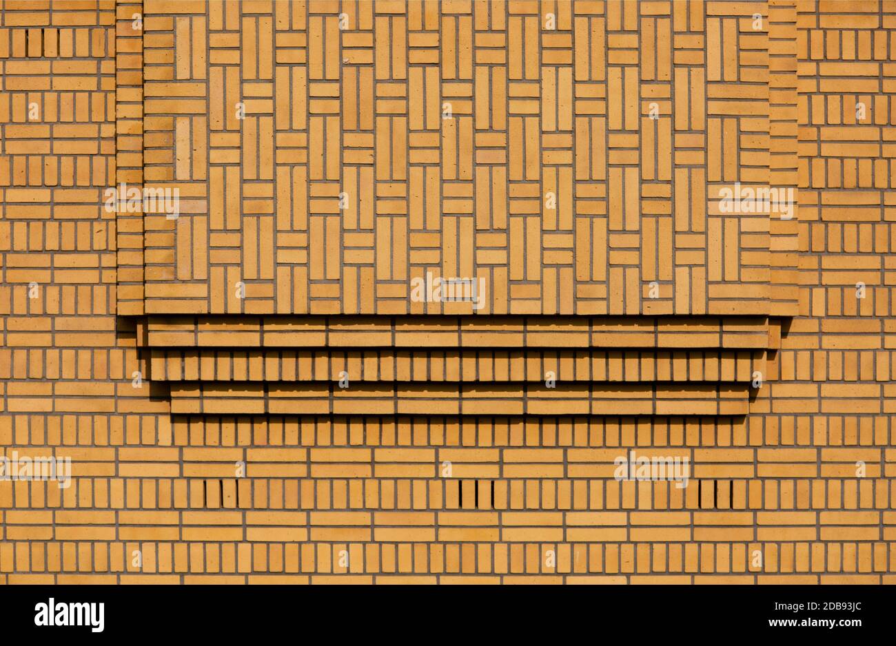 Brick wall of a building in art deco style Stock Photo - Alamy