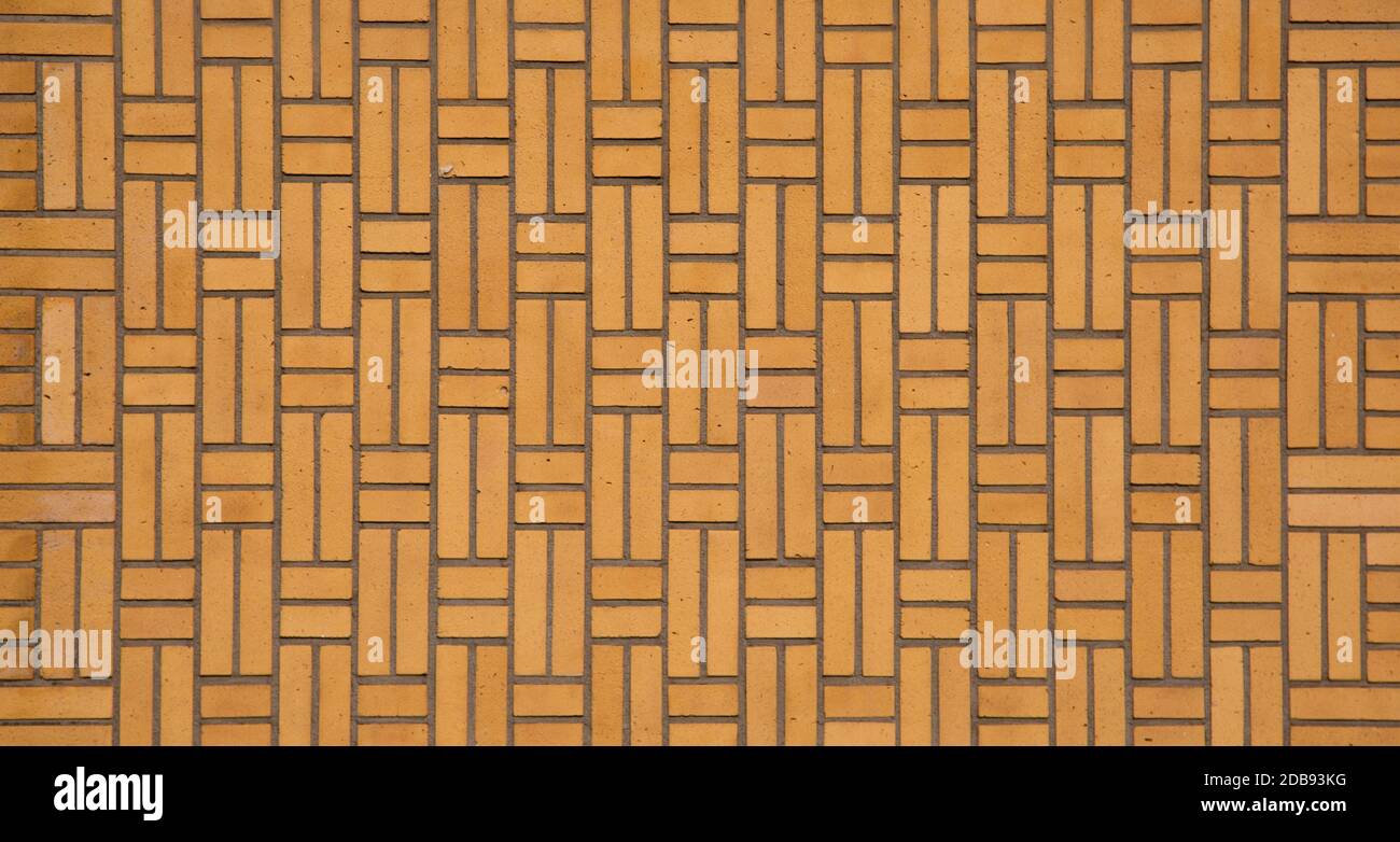 Brick wall of a building in art deco style Stock Photo - Alamy