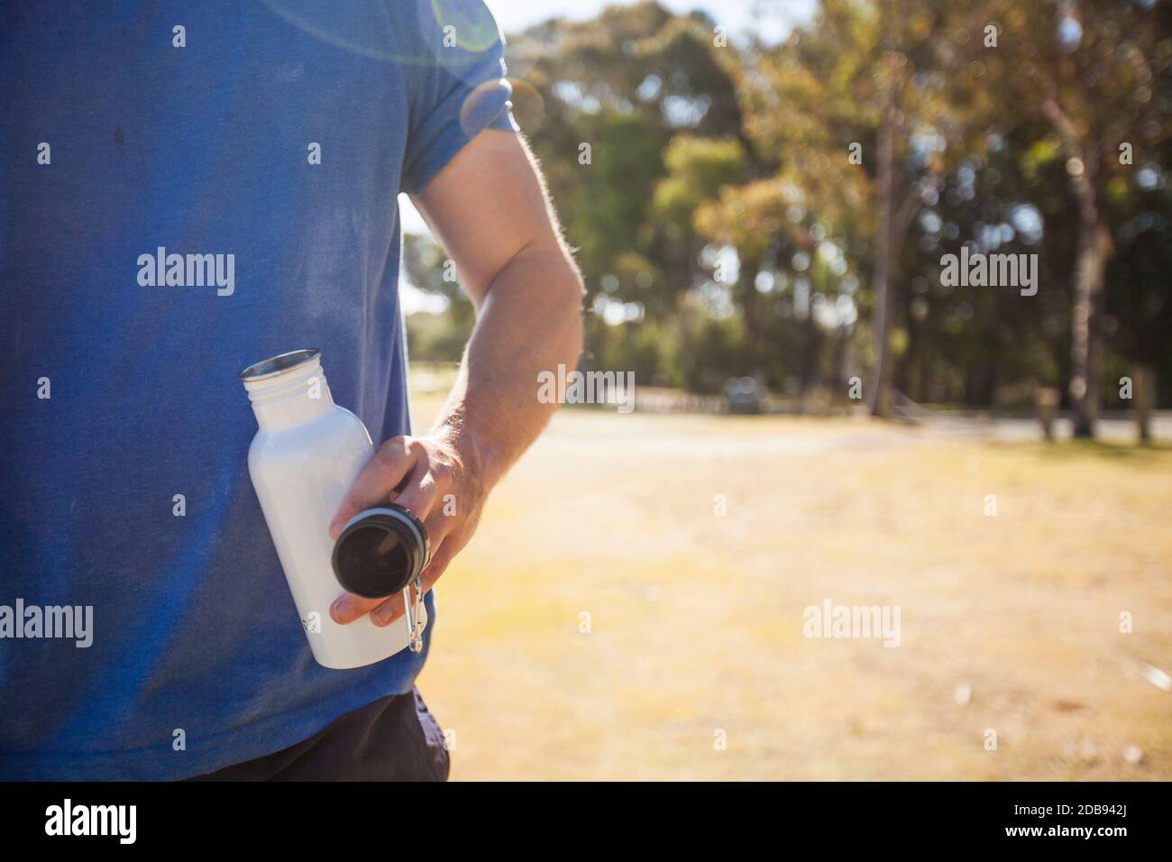 Sportsman with drink Stock Photo - Alamy
