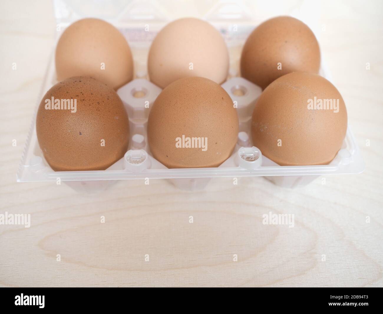 half dozen (six) eggs in carton box Stock Photo - Alamy
