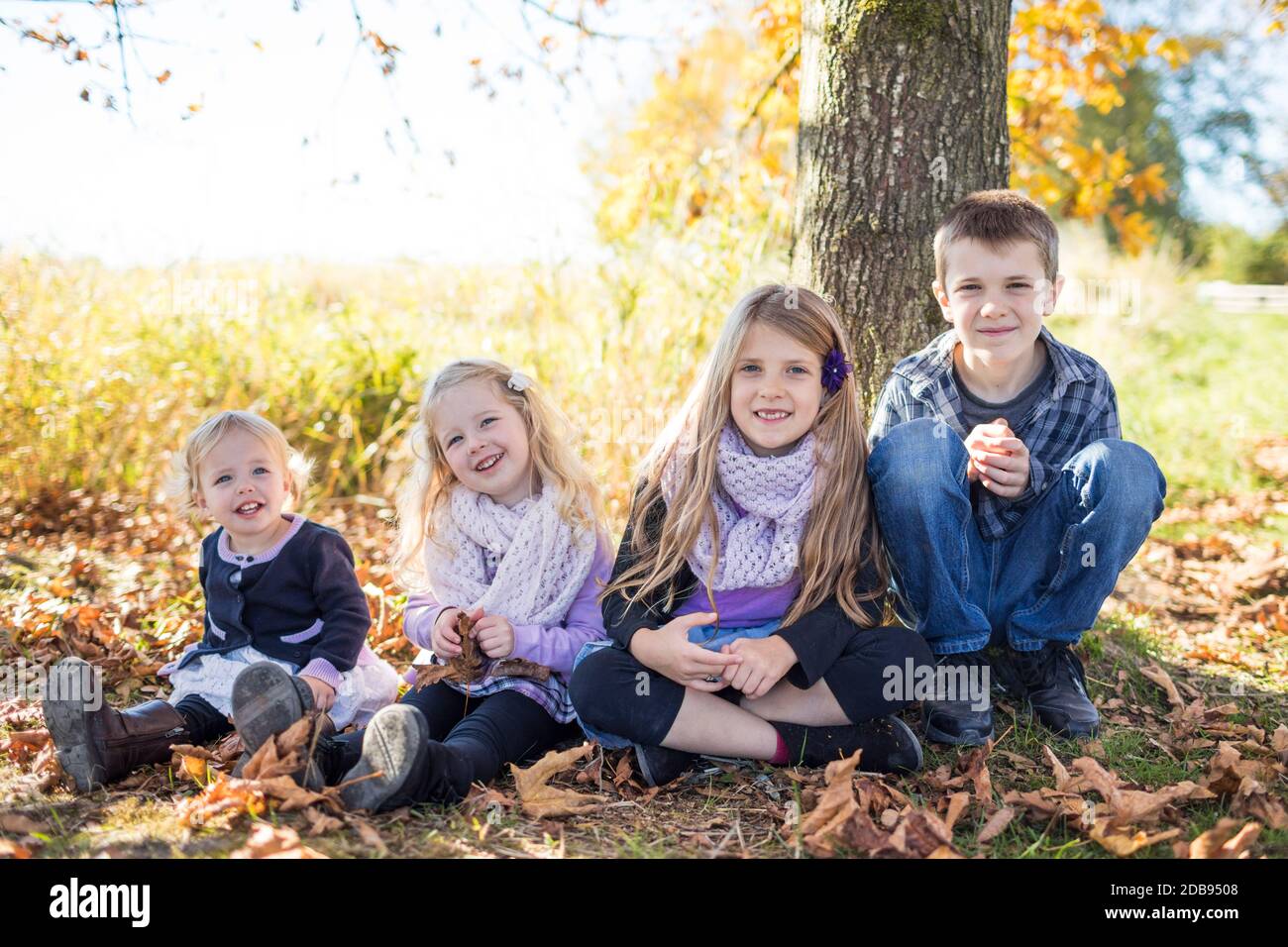 Outdoor portrait of our siblings Stock Photo - Alamy