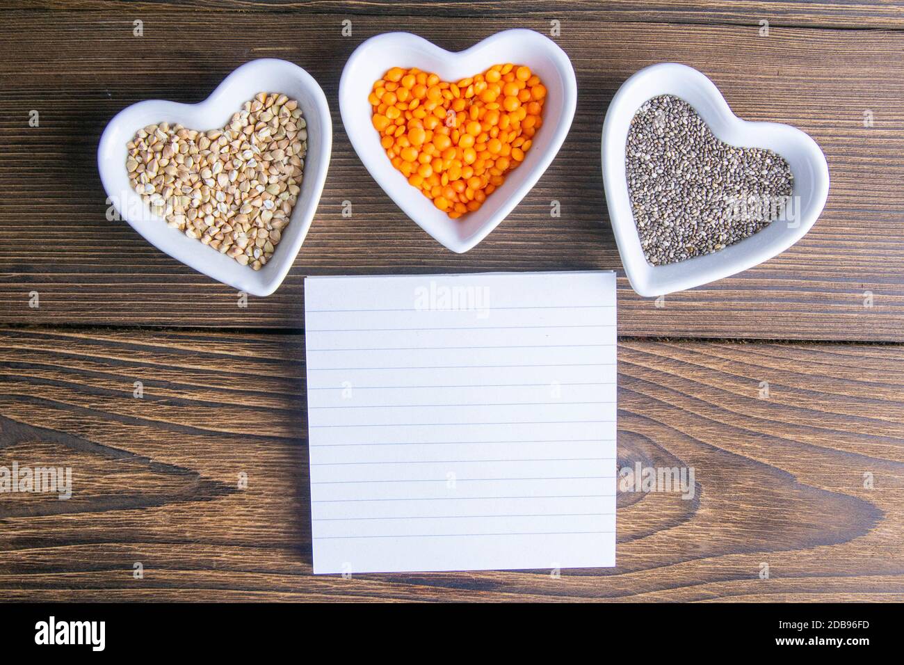 The collection of different foods of healthy food. In bowls there are ...