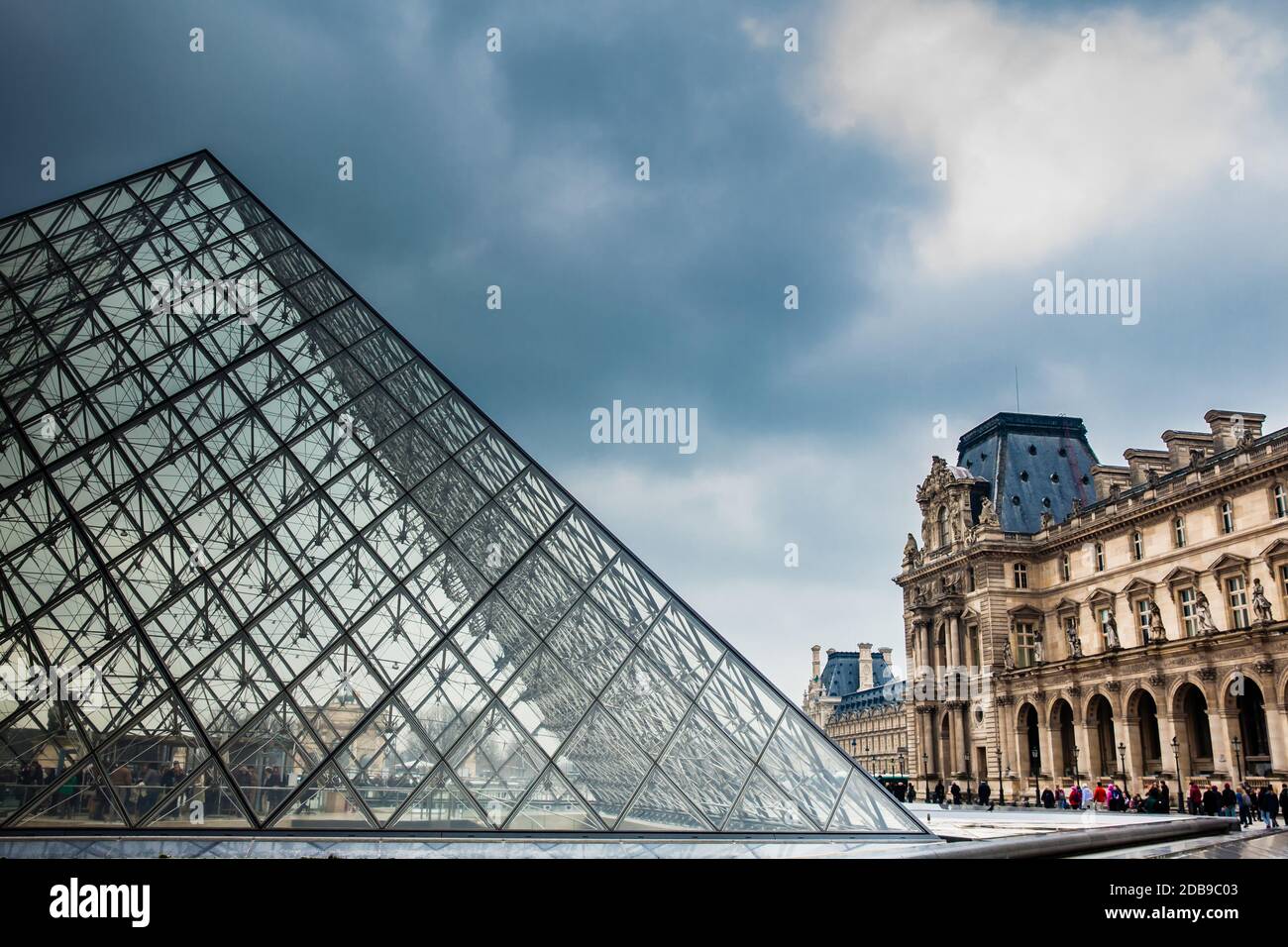 PARIS, FRANCE - MARCH, 2018: The Louvre Museum Pyramid in a freezing ...
