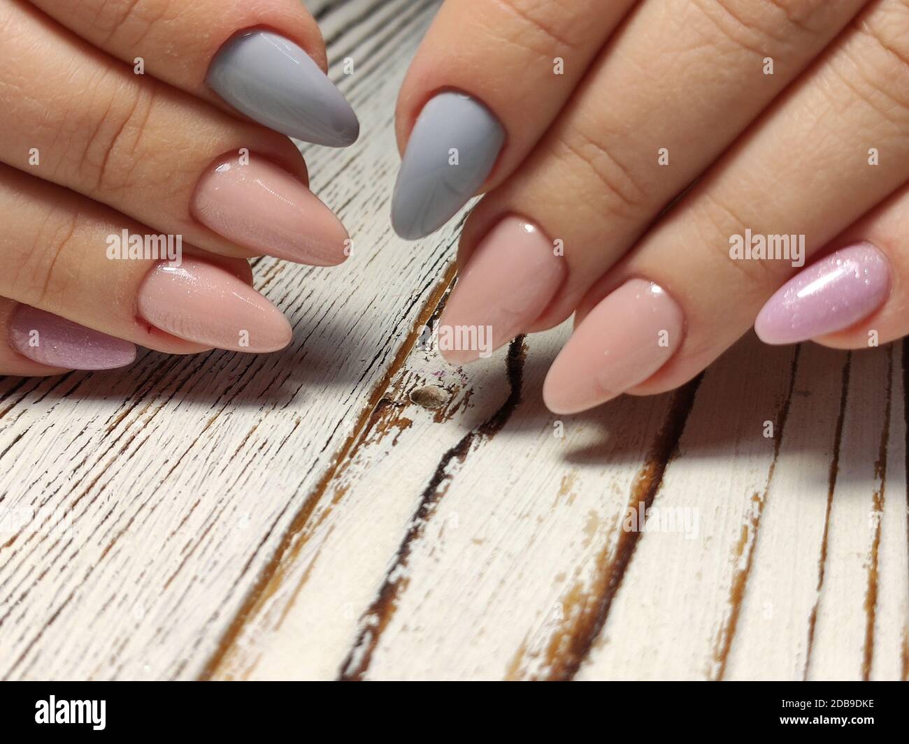 Hands Care. Hand With Pastel Nails In Sea Salt Stock Photo - Alamy