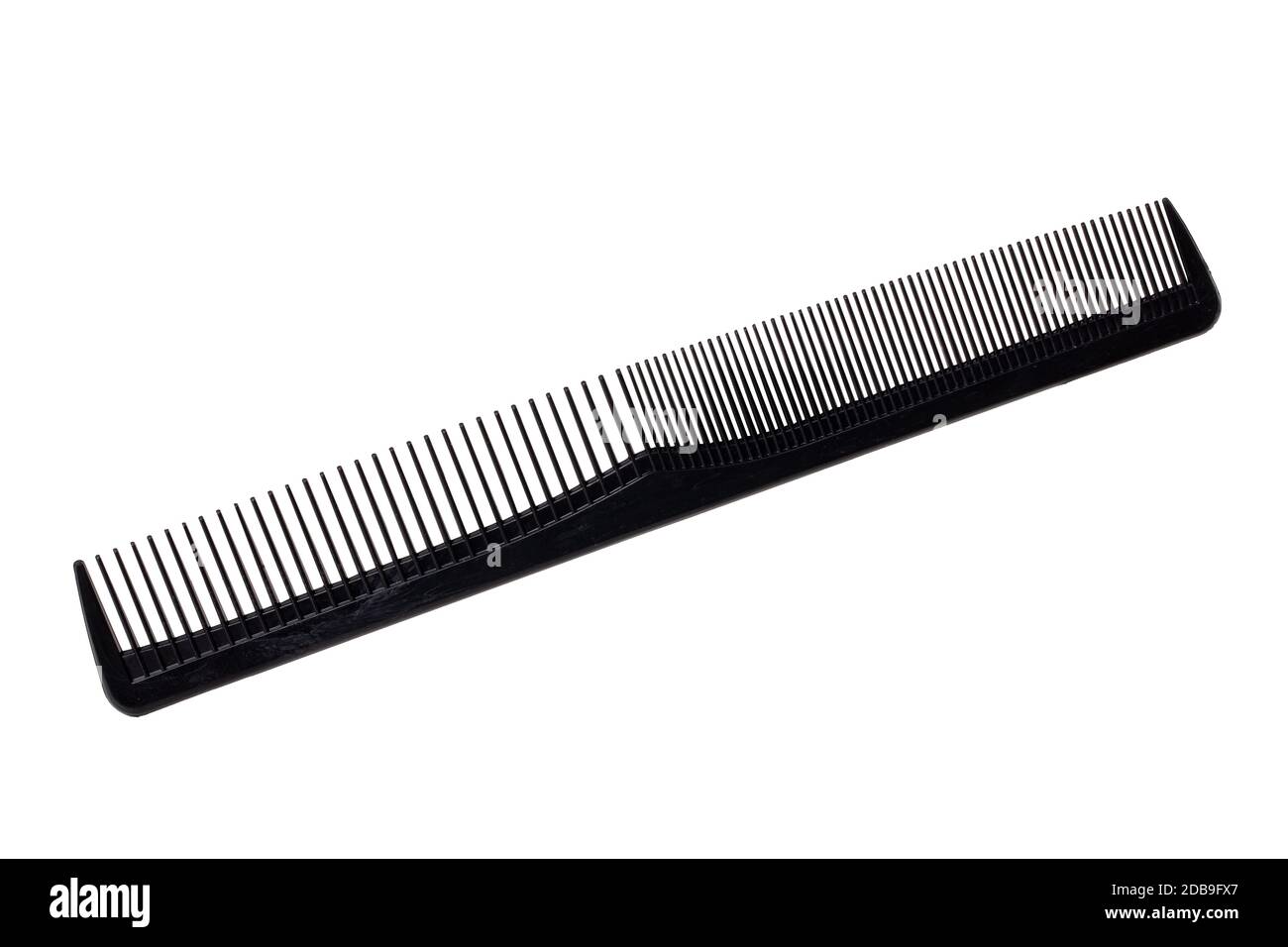 Hairdresser tools isolated. Close-up of a black hair comb isolated on a ...