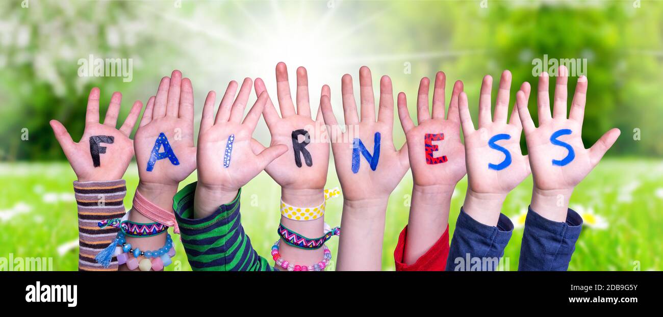 Children Hands Building Colorful Word Fairness. Sunny Green Grass ...