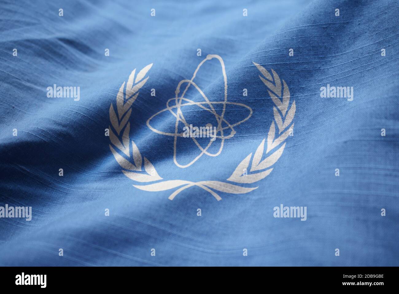 Closeup of Ruffled International Atomic Energy Agency Flag, IAEA Flag ...