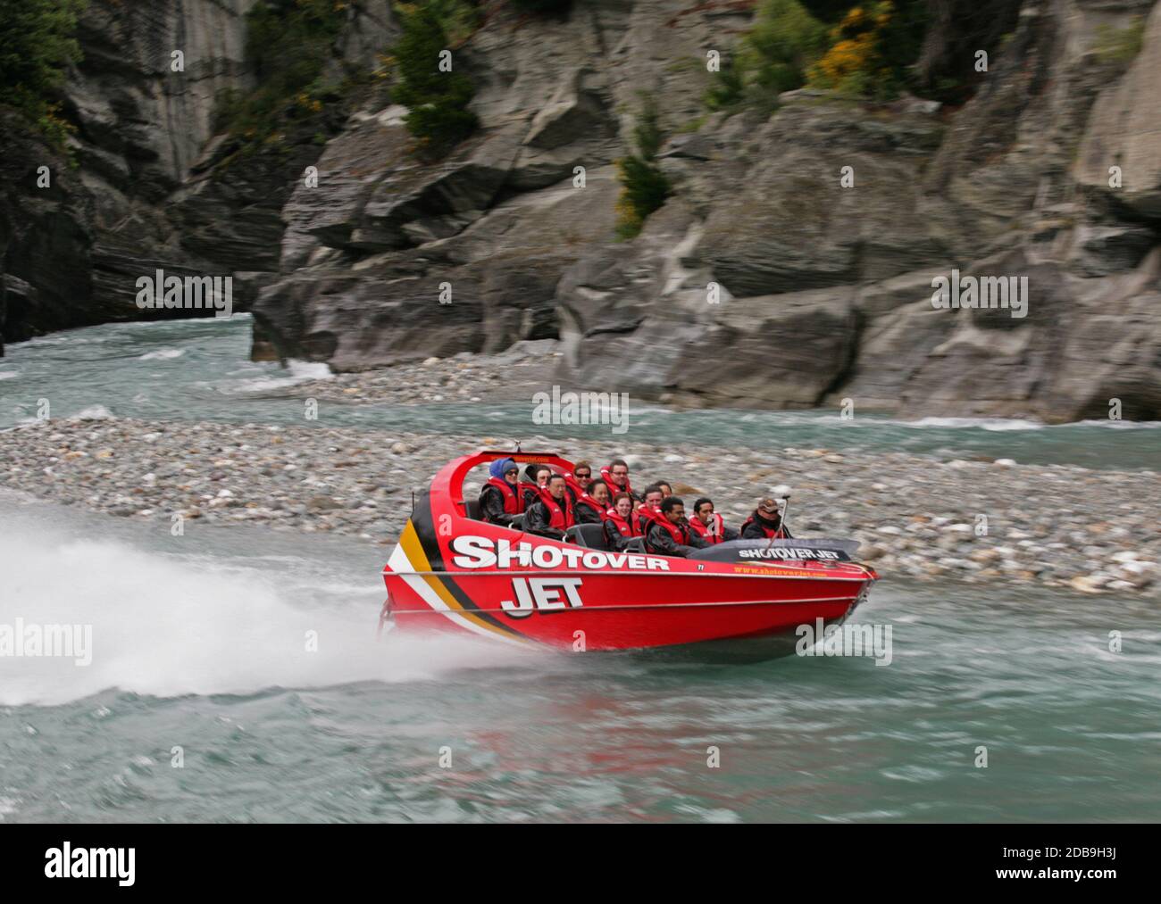 Tourists enjoy their ride on the Shotover jet boating on the Shotover ...