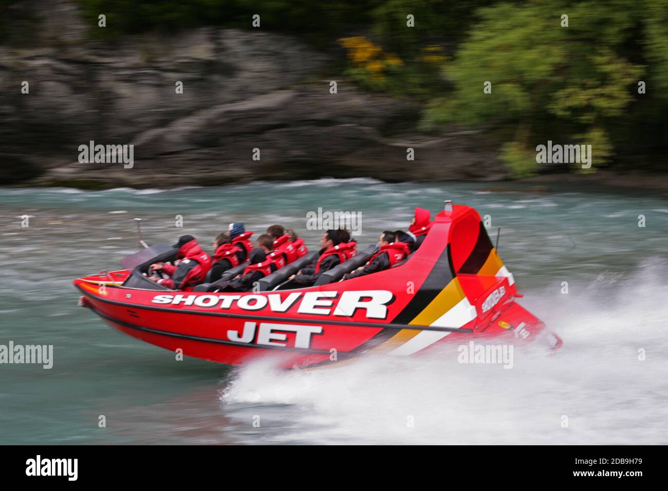 Tourists enjoy their ride on the Shotover jet boating on the Shotover ...