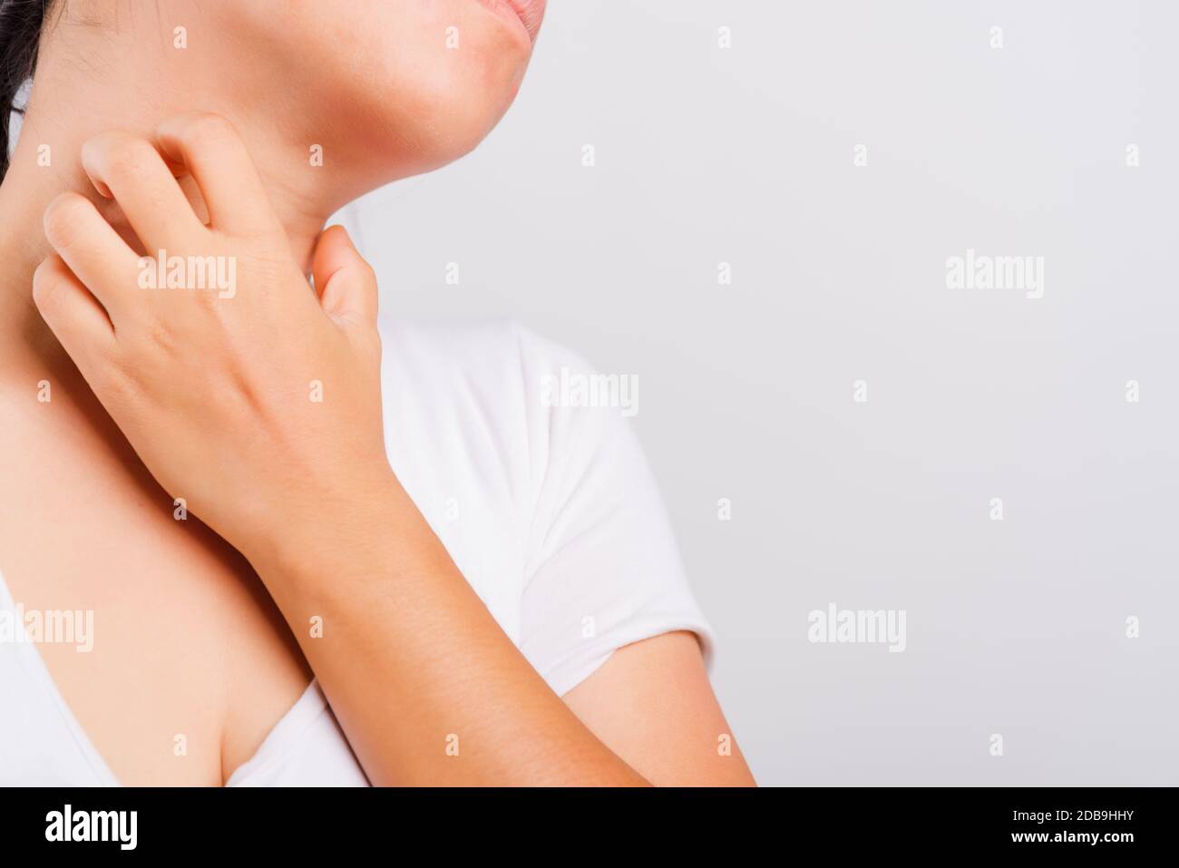 Asian beautiful woman itching her useing hand scratch itch neck on ...