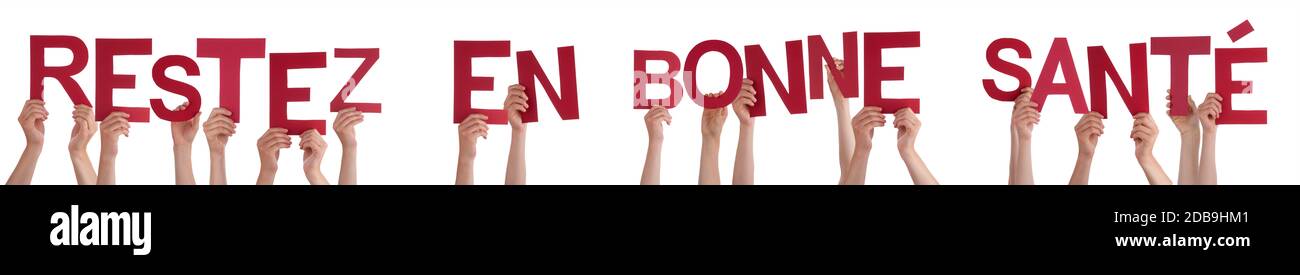People Hands Holding Colorful French Word Restez En Bonne Sante Means ...