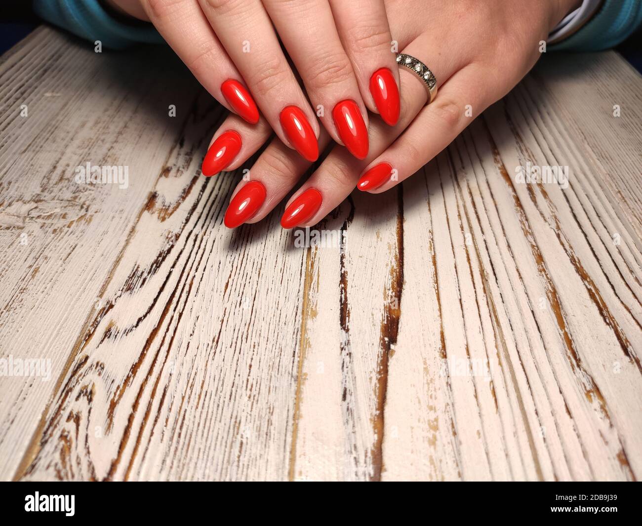 Autumn manicure. Beautyful nails design with autumn leaves. Top view ...