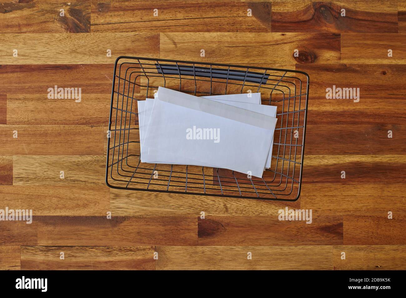 A studio photo of a wire basket Stock Photo - Alamy