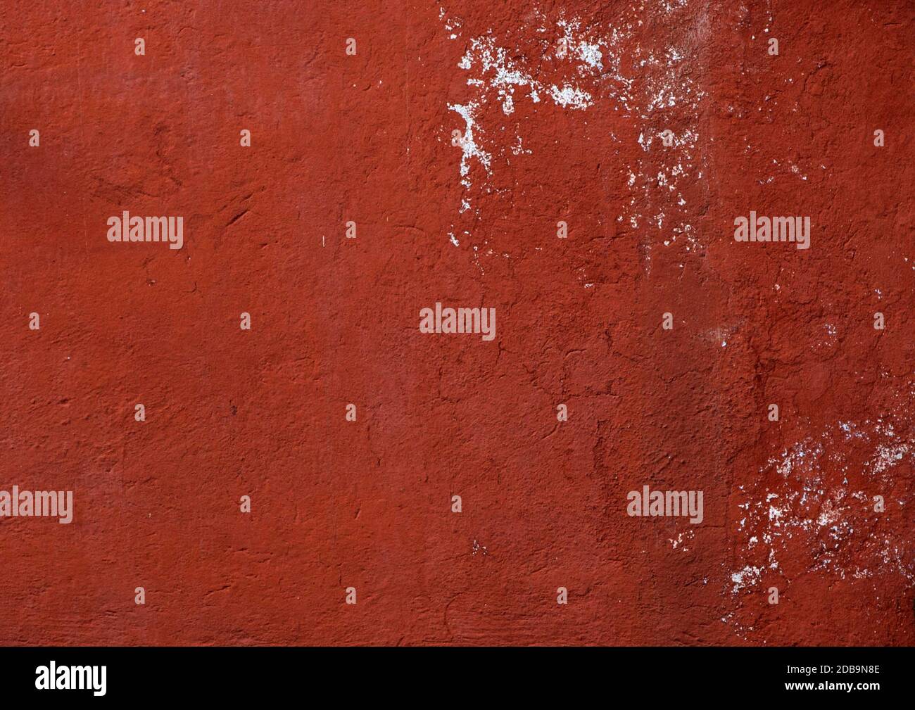 Texture red colored plaster on the wall Stock Photo - Alamy