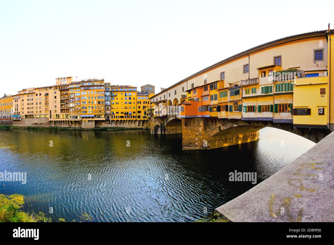 Famous Ponte Vecchio bridge over river Arno in Florence Stock Photo - Alamy