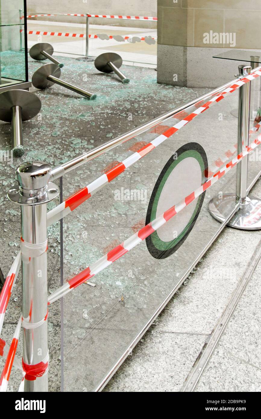 Damaged restaurant with broken windows and tables Stock Photo - Alamy